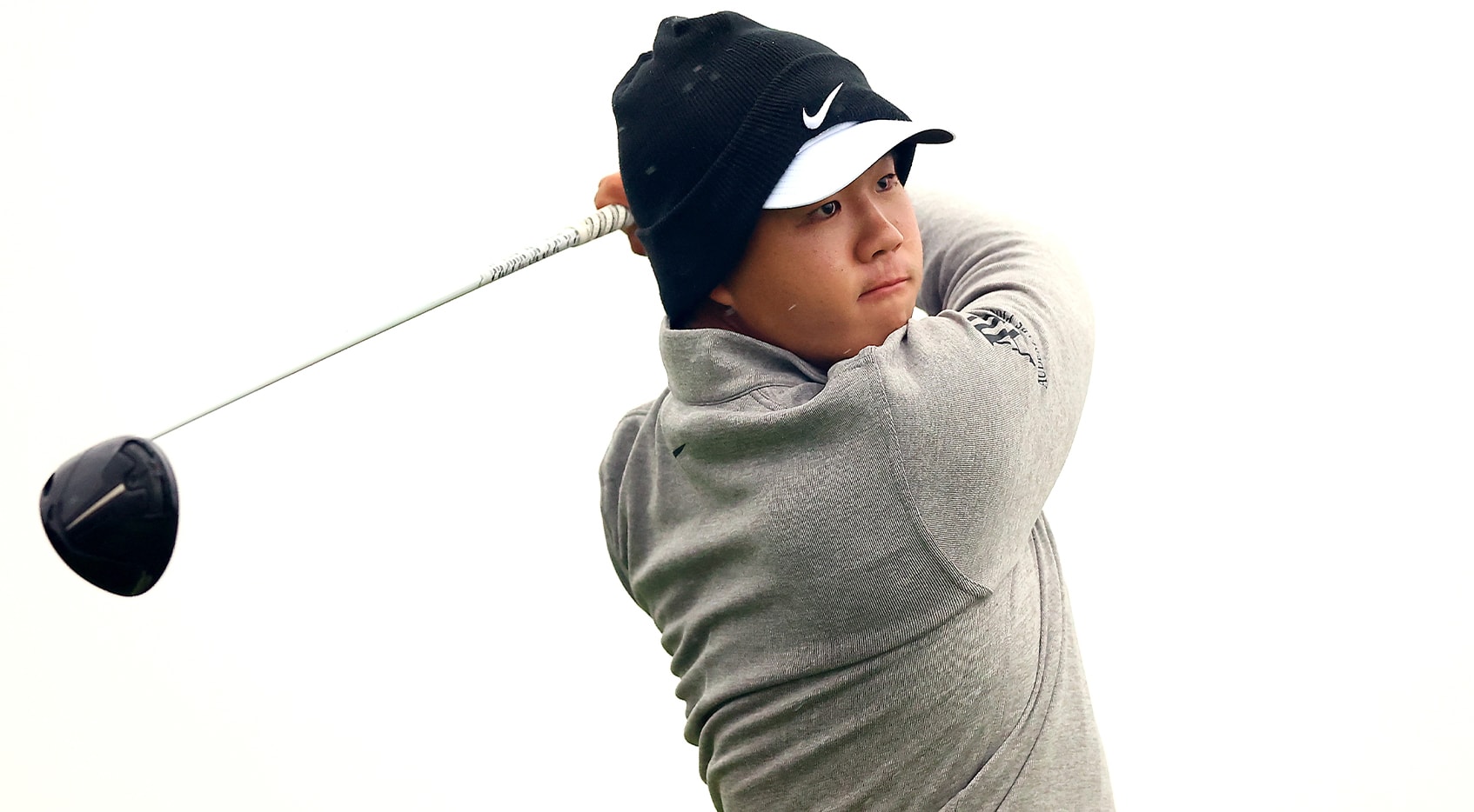 Tom Kim handles difficult weather to take one-shot lead at Cazoo Open ...