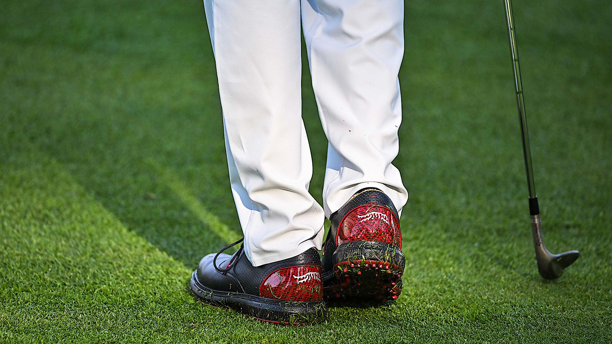 Tiger Woods spotted with new 'Sun Day Red' golf shoes Tiger Woods spotted with new 'Sun Day Red' golf shoes