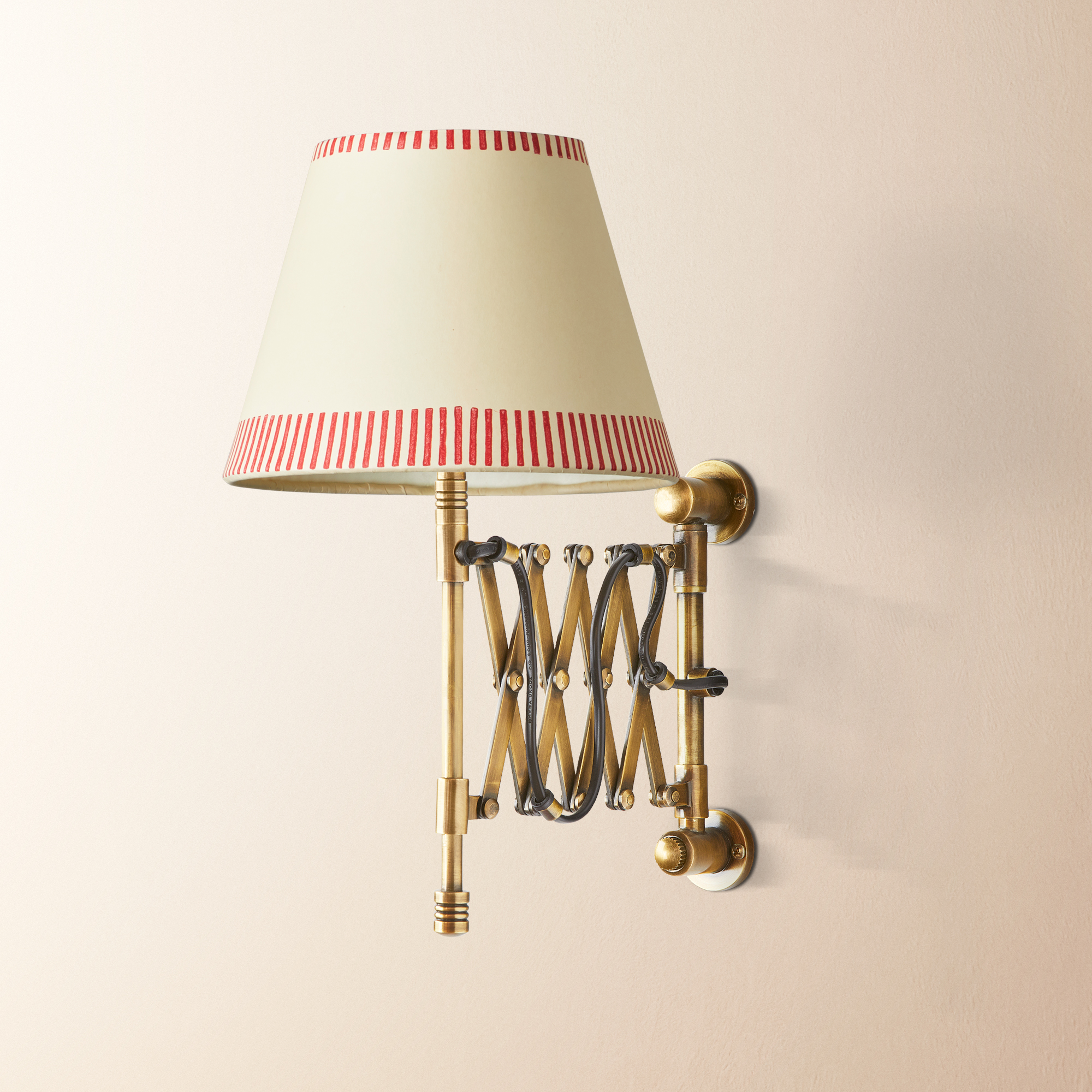 Tina wall fitting in antique brass