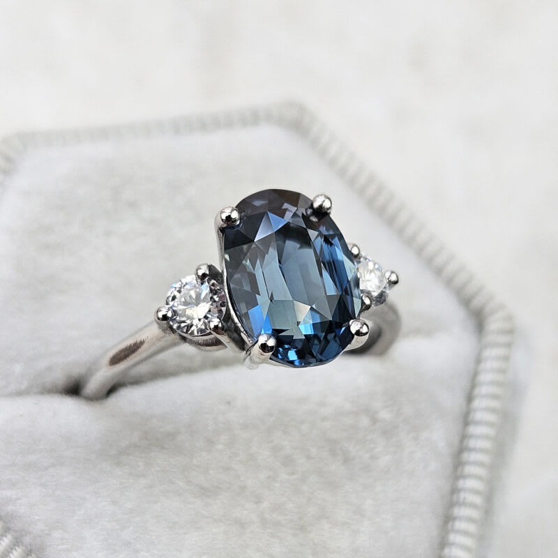 Ocean blue oval sapphire and diamond trilogy ring | Aardvark Jewellery