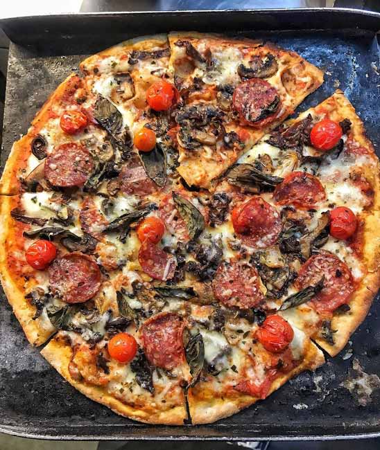 10 Amazing Pizza Places In Town Where You Can Drown In An Ocean Of Cheese