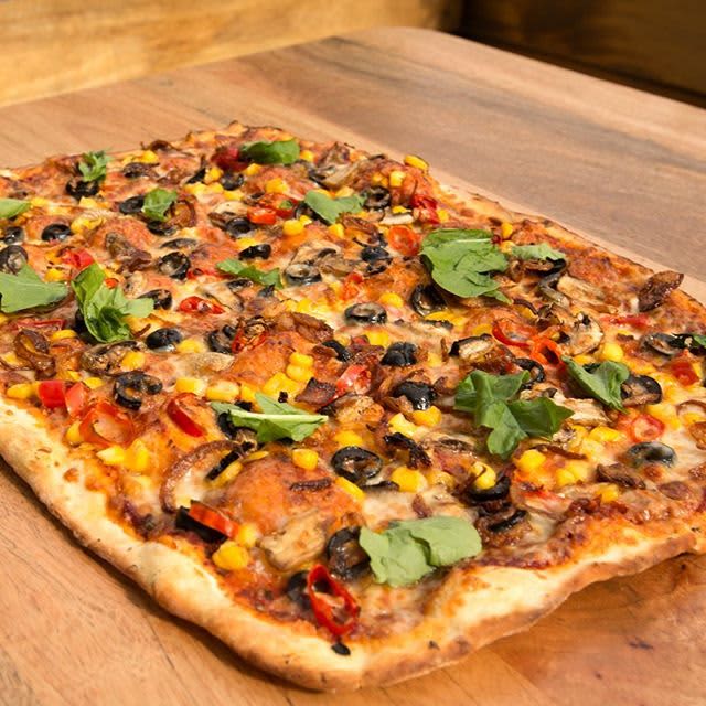 Places Serving Monster Pizzas In Delhi | So Delhi