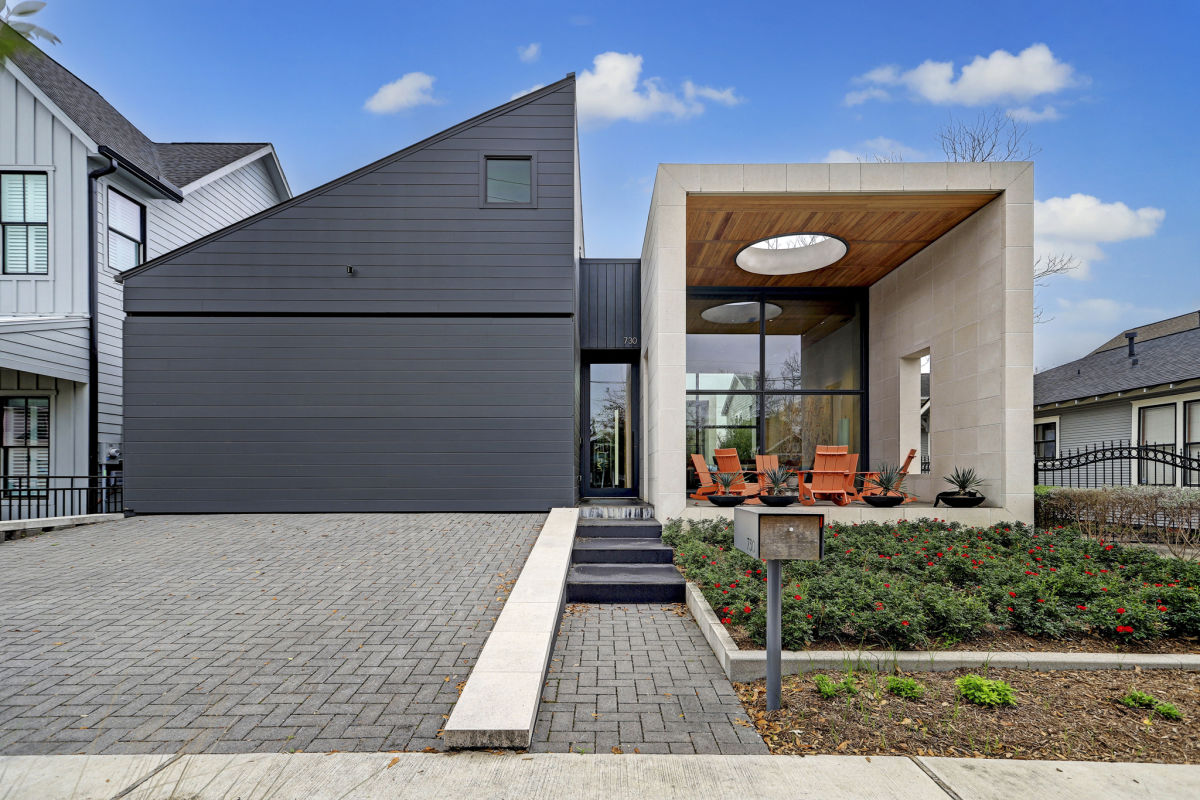 Heights home features modern shapes on the outside and expansive ...