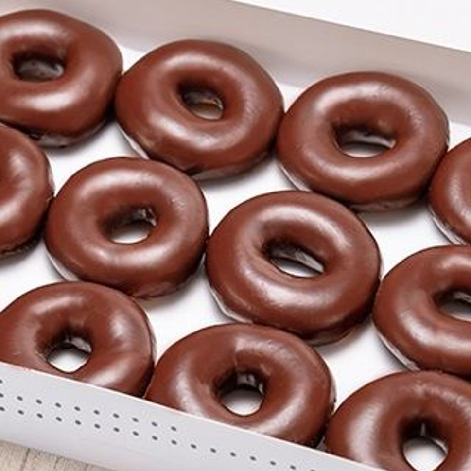 50% de rebaja en Docena de Donas Glaseadas en Krispy Kreme Uber Eats