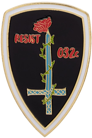 032c: Gold & Black 'Resist' Pin | SSENSE