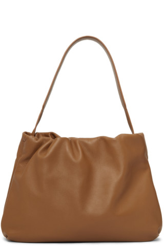 The Row: Sac à bandoulière brun clair en cuir | SSENSE France