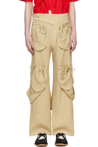 STRONGTHE: Beige Pouch Cargo Pants | SSENSE Canada
