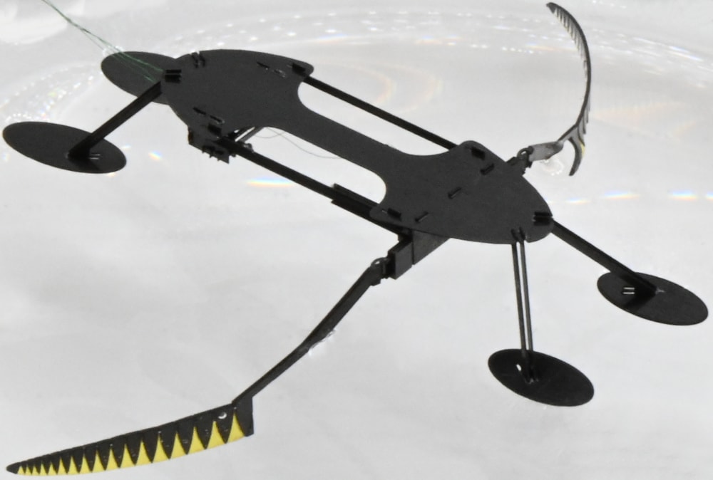 WaterStrider: A New 56-mg Controllable Microswimmer Driven by a New 1 ...