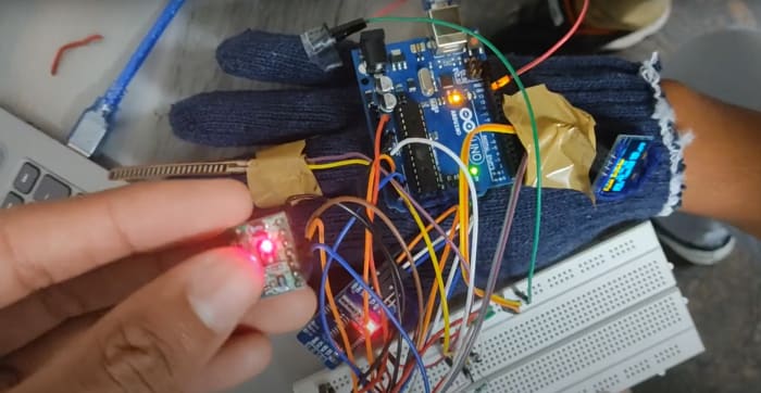 Low Cost Smart Glove for Health Monitoring