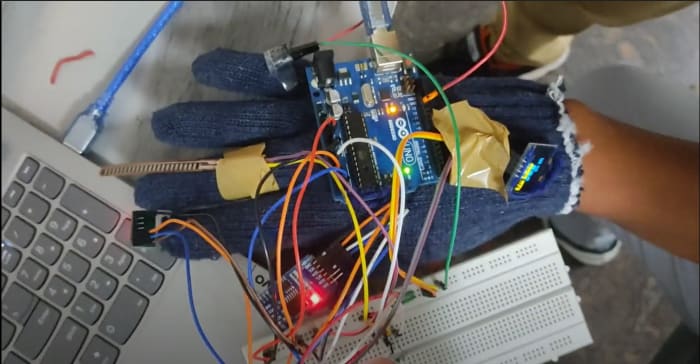 Low Cost Smart Glove for Health Monitoring