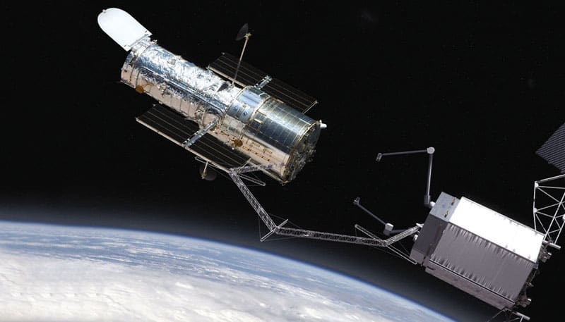 Compact, Long-Reach Robotic Arm - Tech Briefs