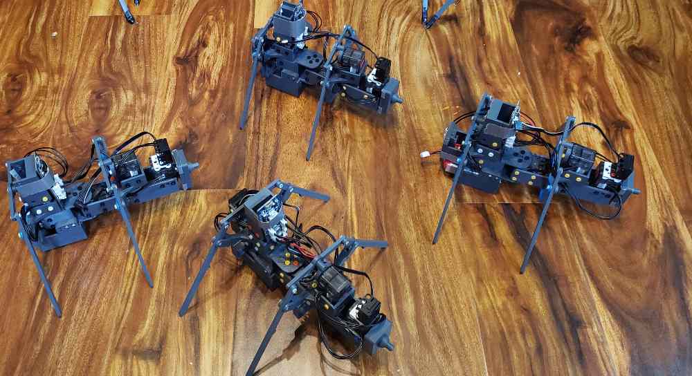 Four-Legged 'Swarm' Robots Traverse Tough Terrain — Together - Tech Briefs