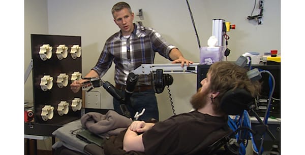 Neural Interface Allows Brain to Experience Touch through Robotic Arm ...