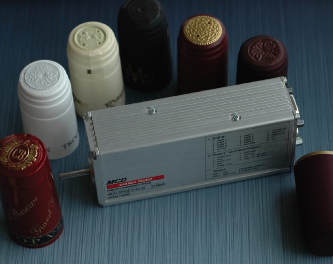 Maxon Drive Prevents Bottlenecks for Bottle Cap Maker - Tech Briefs