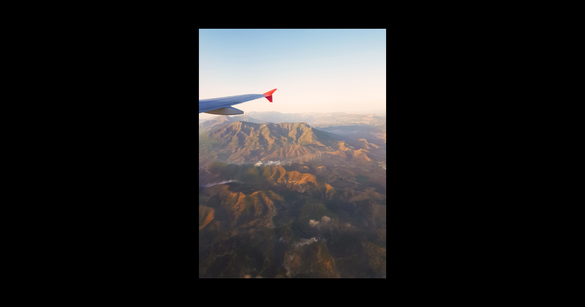 Aerial Photography of Airplane Wing - Airplane Wing - Sticker | TeePublic