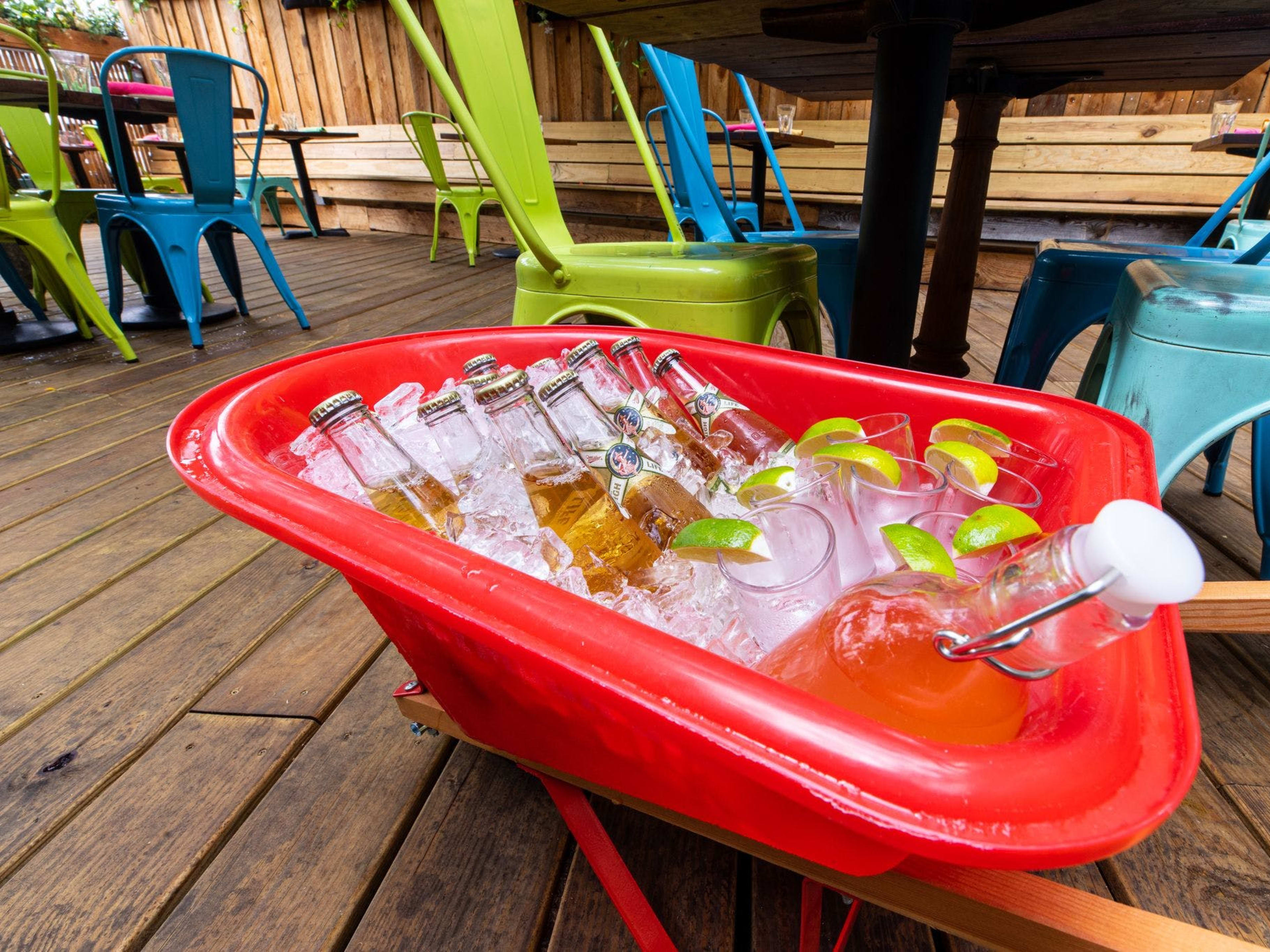 This New All-Outdoor Restaurant Serves Cocktails By The Wheelbarrow ...
