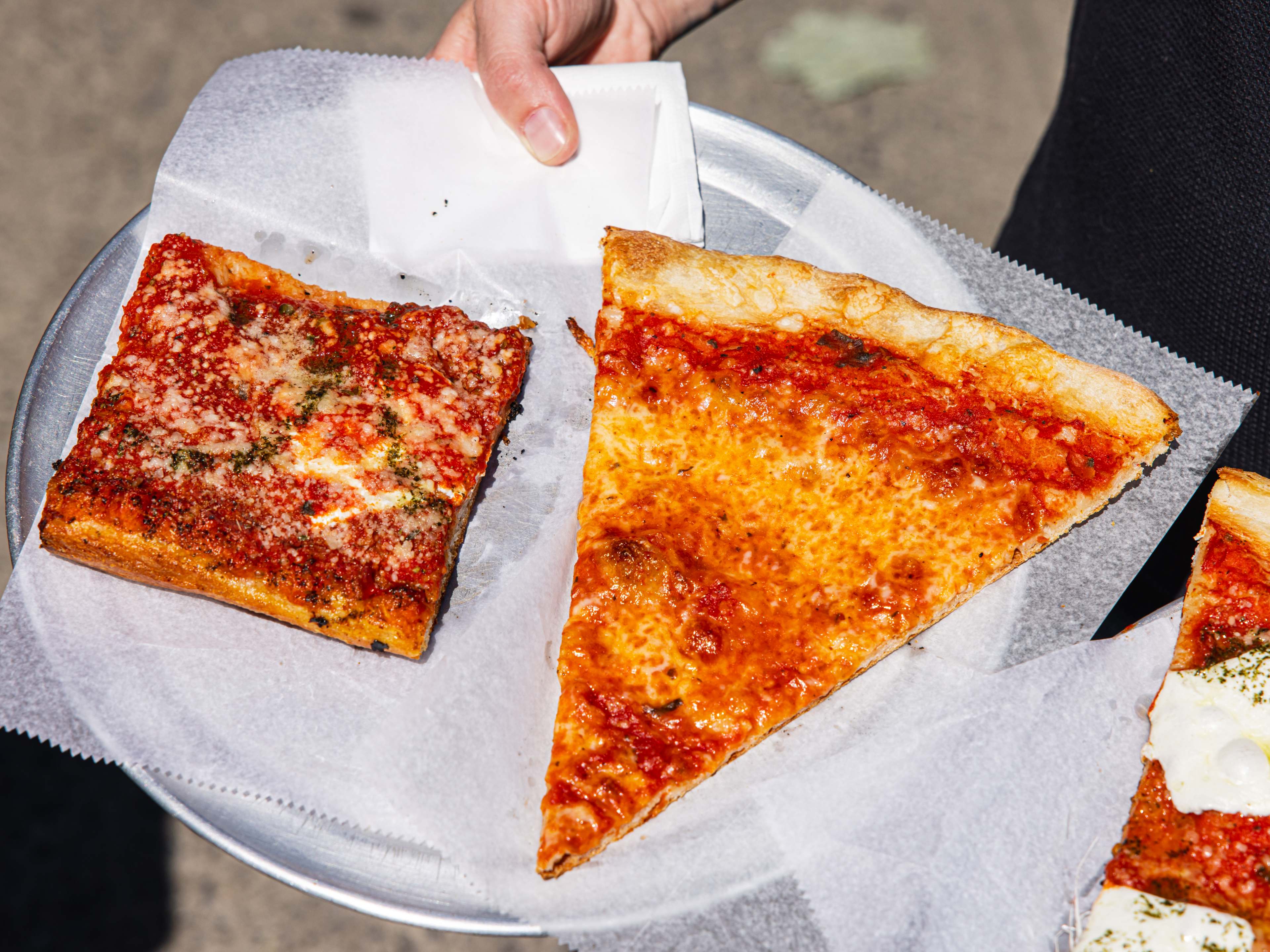 Luigi’s has been perfecting their lopsided pies since 1973 - Review ...