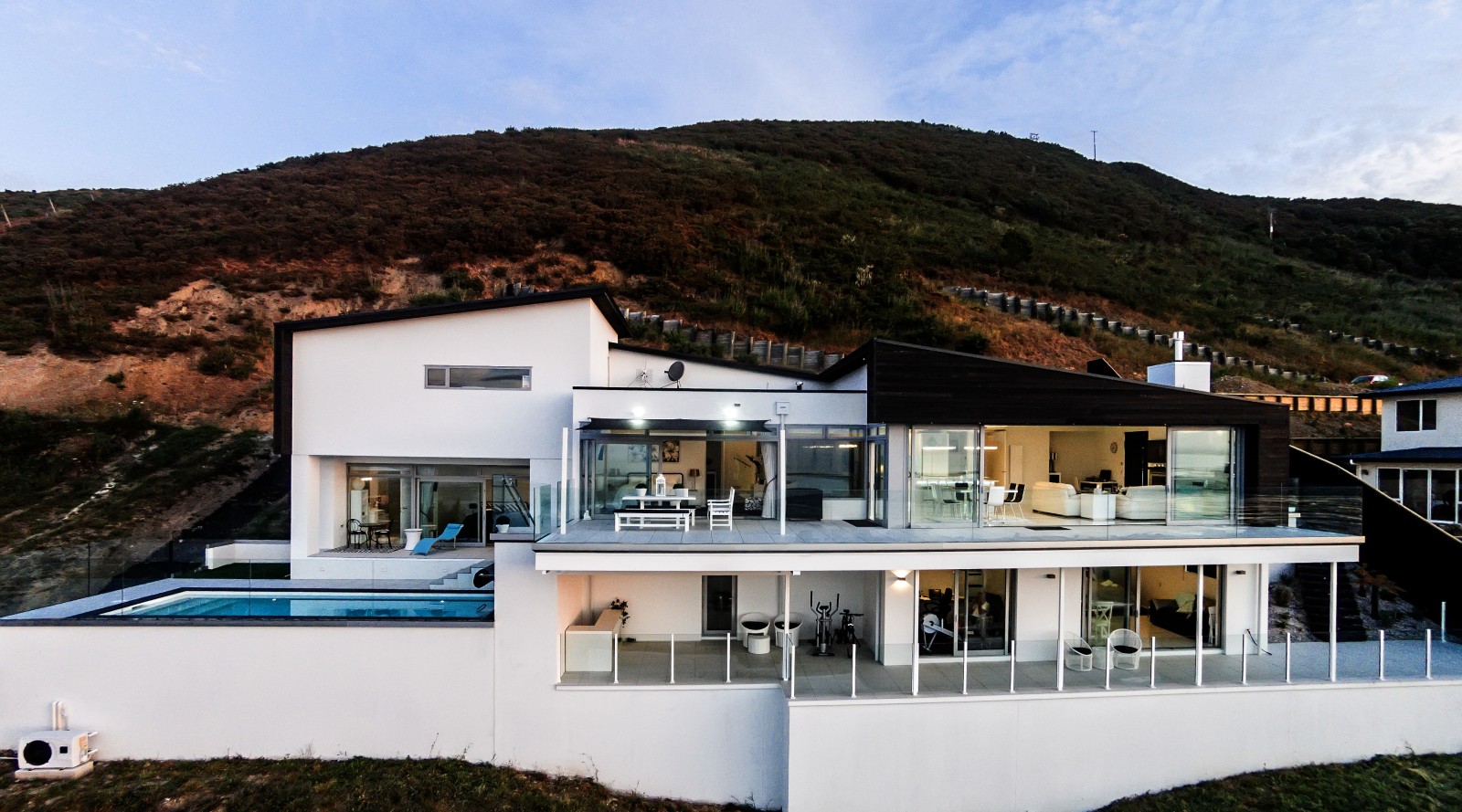 European-style coastal home with split levels and… | Trends