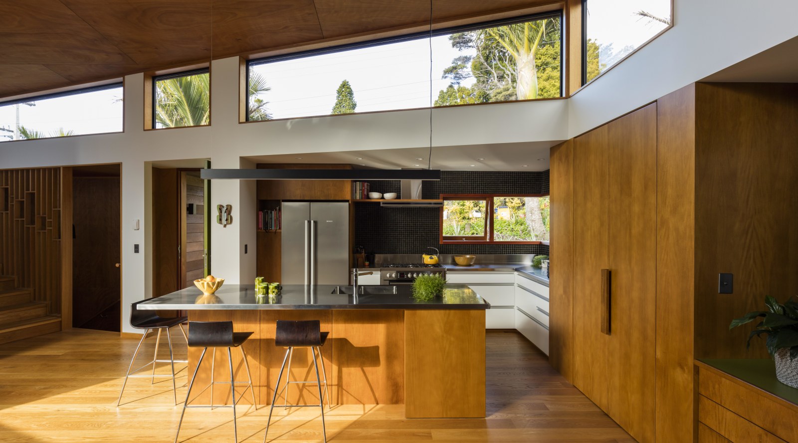 A variety of wood species feature in this new home… | Trends