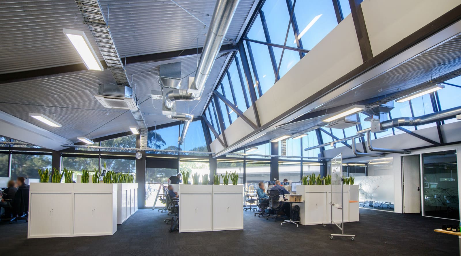 Reinvented sawtooth-roof building needed custom… | Trends