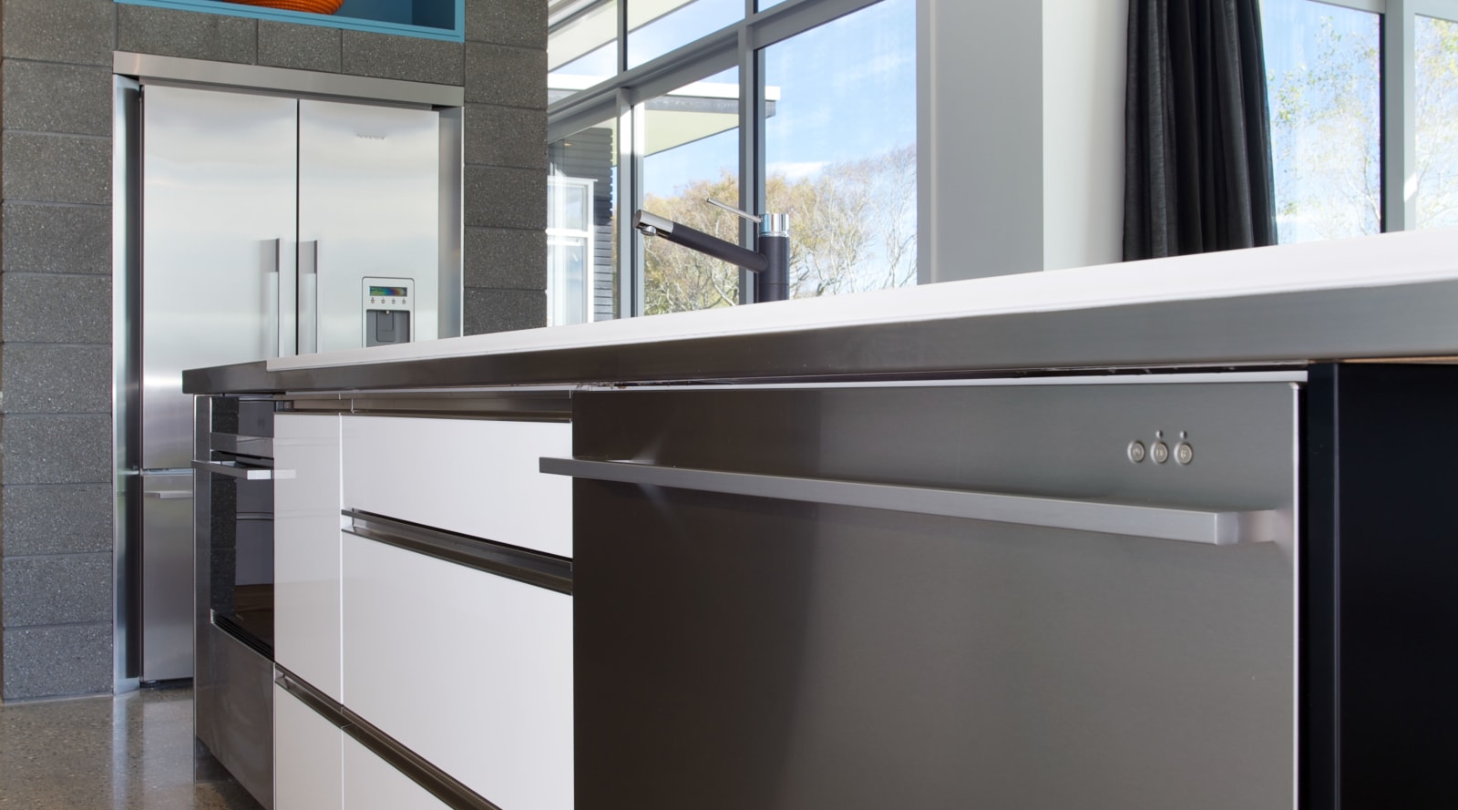 Modern kitchen with bank of ovens, induction… | Trends