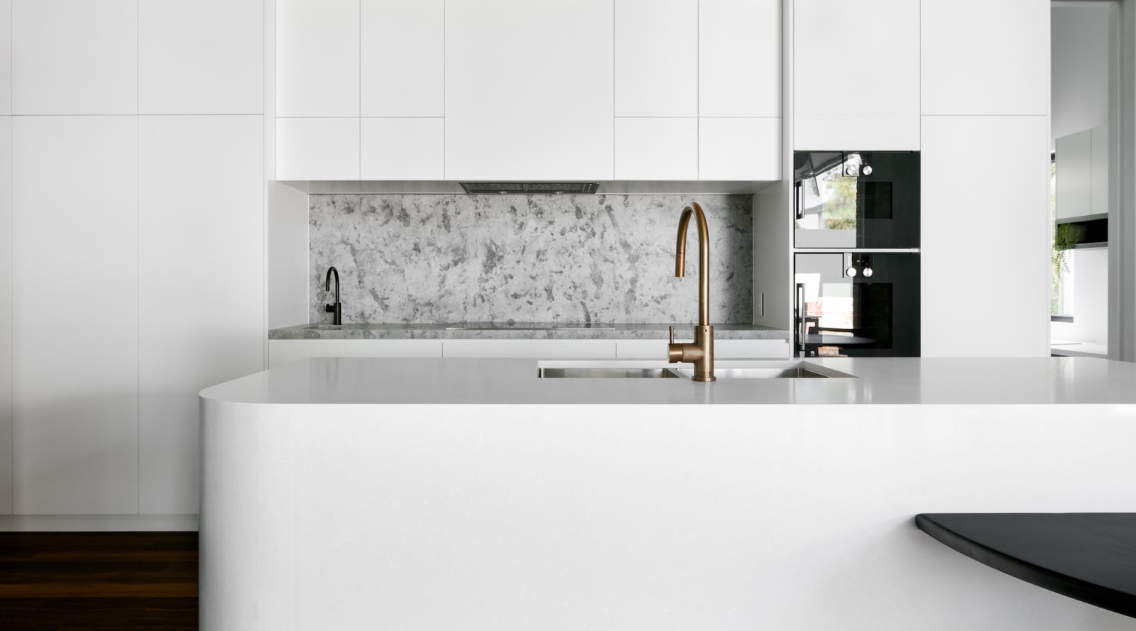 All set in engineered concrete, splashback with a… | Trends