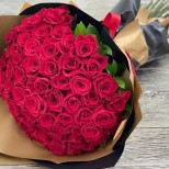 Send Fifty Long Stem Premium Red Roses With Greens Wrapped in Wasaga ...