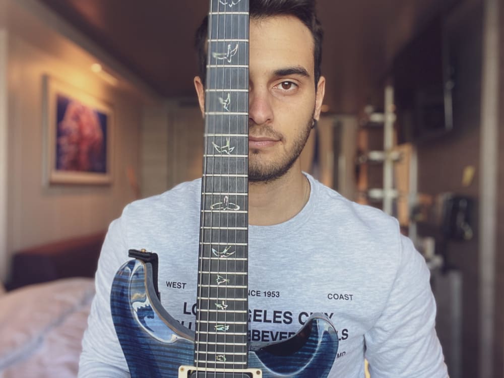 Amazing guitars for your song in the style of Coldplay/U2 | Upwork