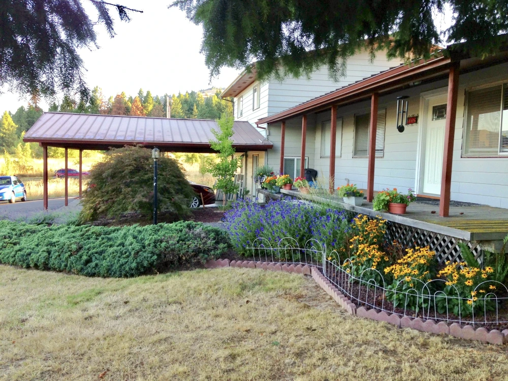 A custom hand-drawn 2D scale landscape design and plant list with ...