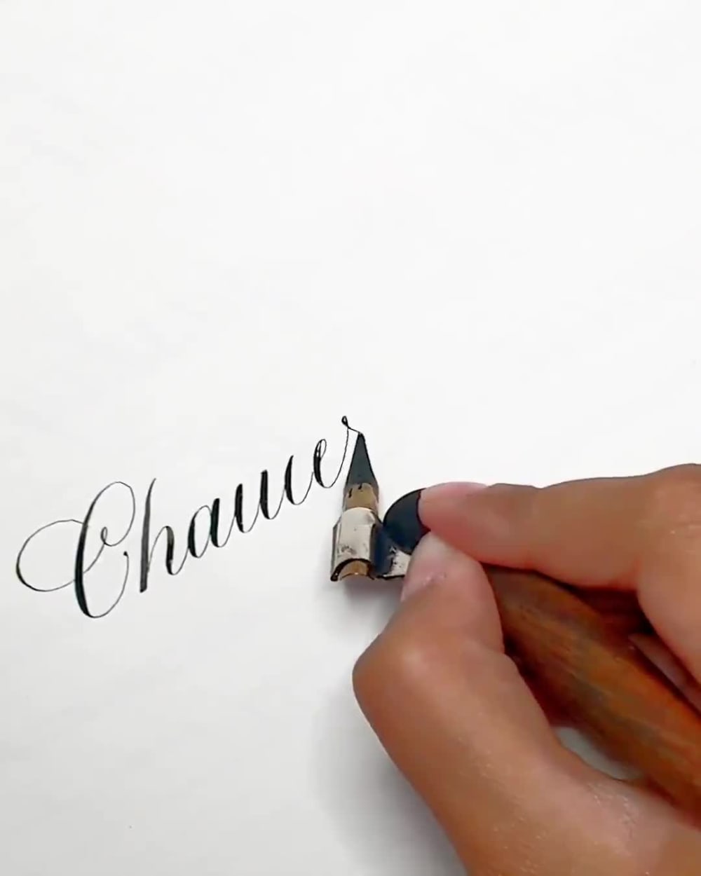 An aesthetic calligraphy video of upto 5 words written by a ...