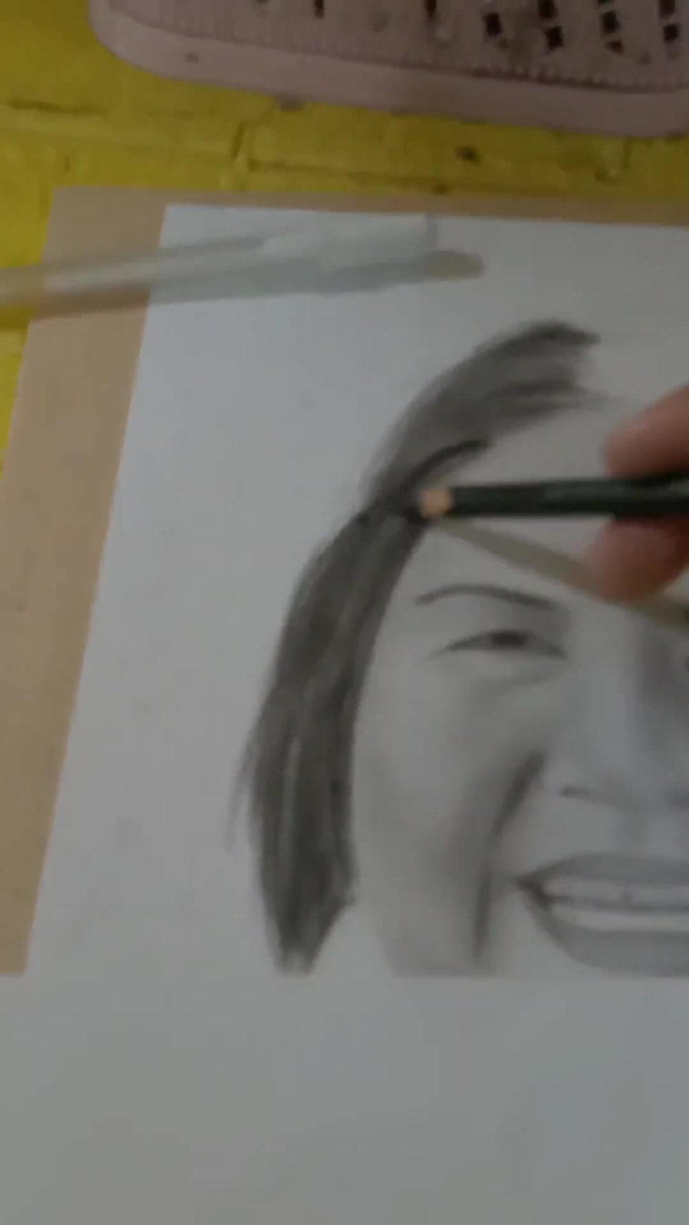 A detailed traditional graphite and charcoal portraits | Upwork