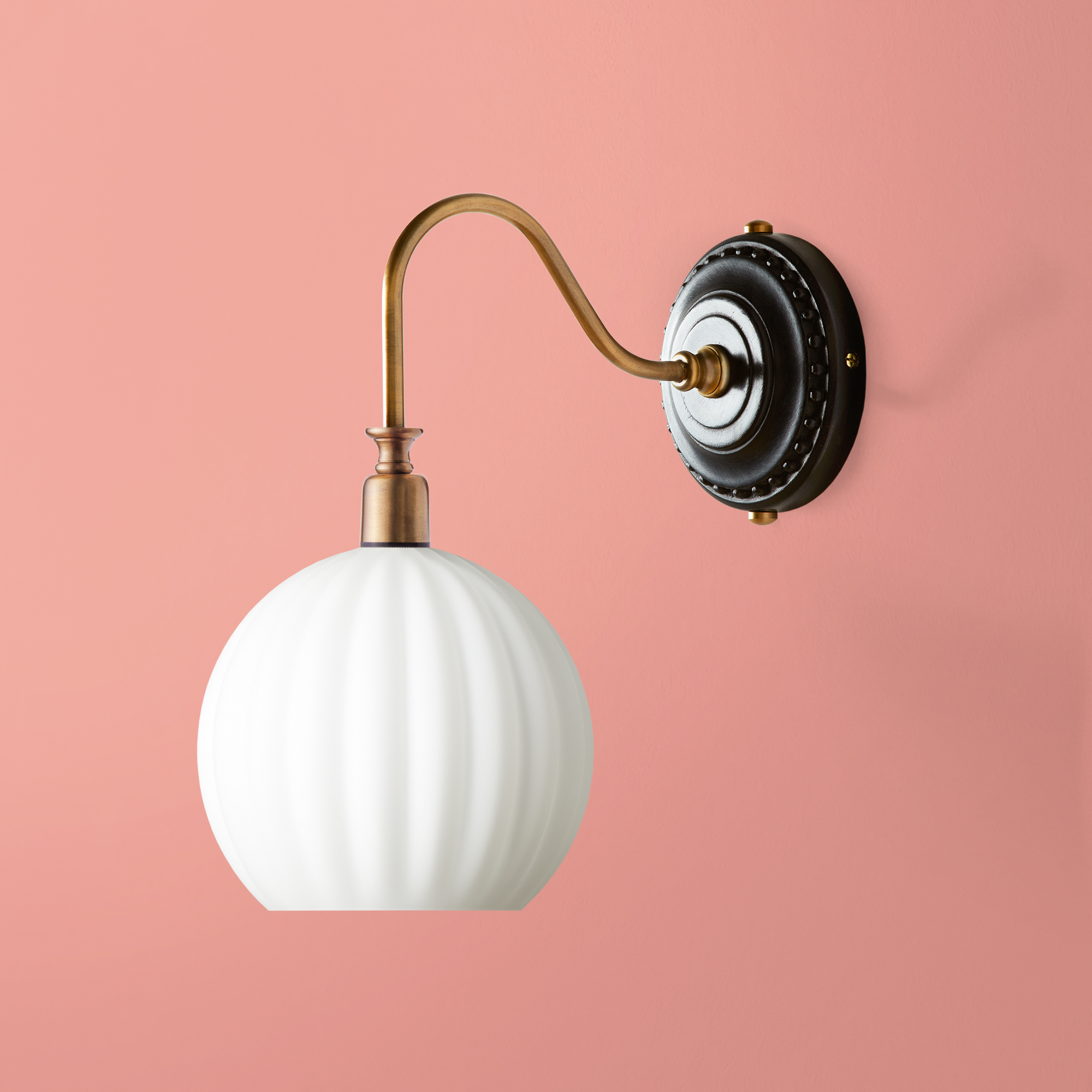 Drake wall fixture in wood and antiqued brass
