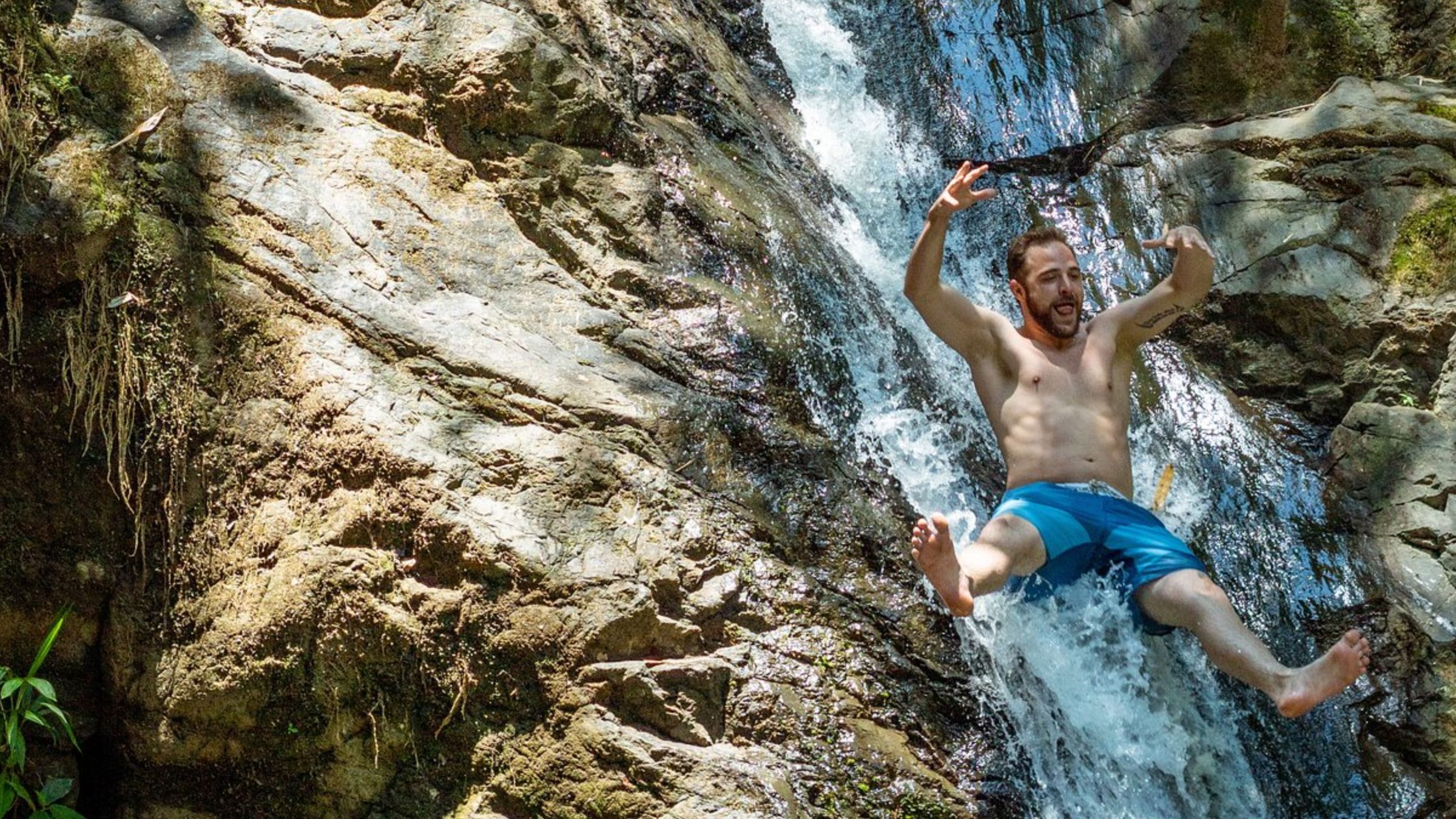 Waterfalls, a cave, the beach, and jungle slides all in one tour