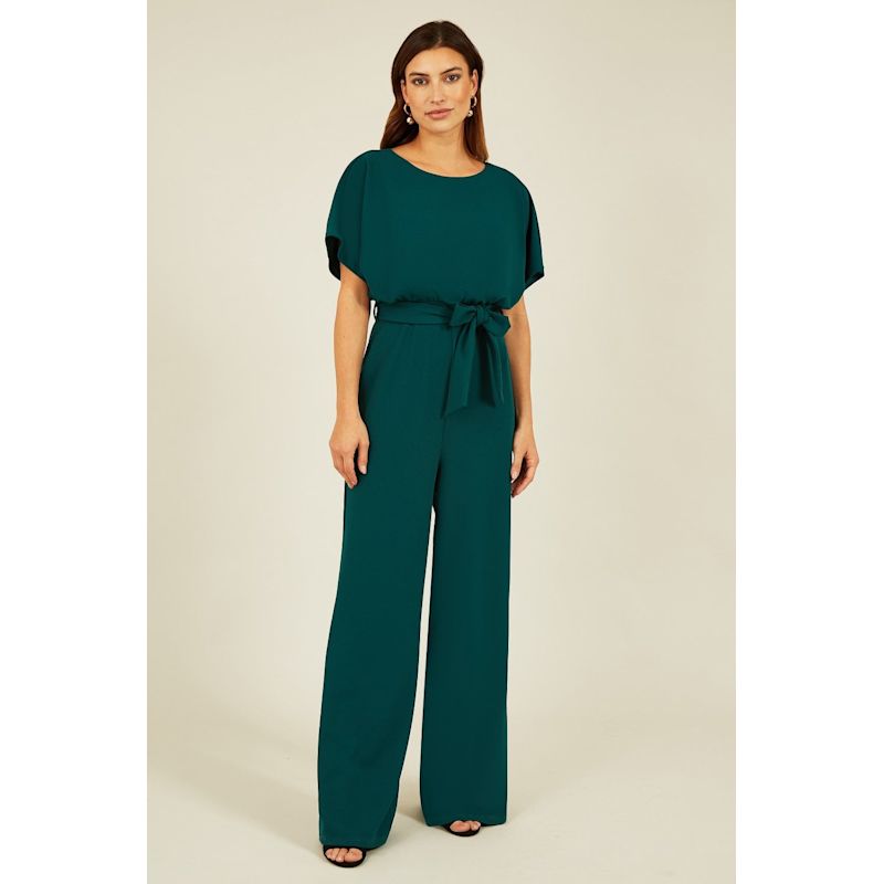 Mela Batwing Stretch Jumpsuit In Green | Yumi | Wolf & Badger