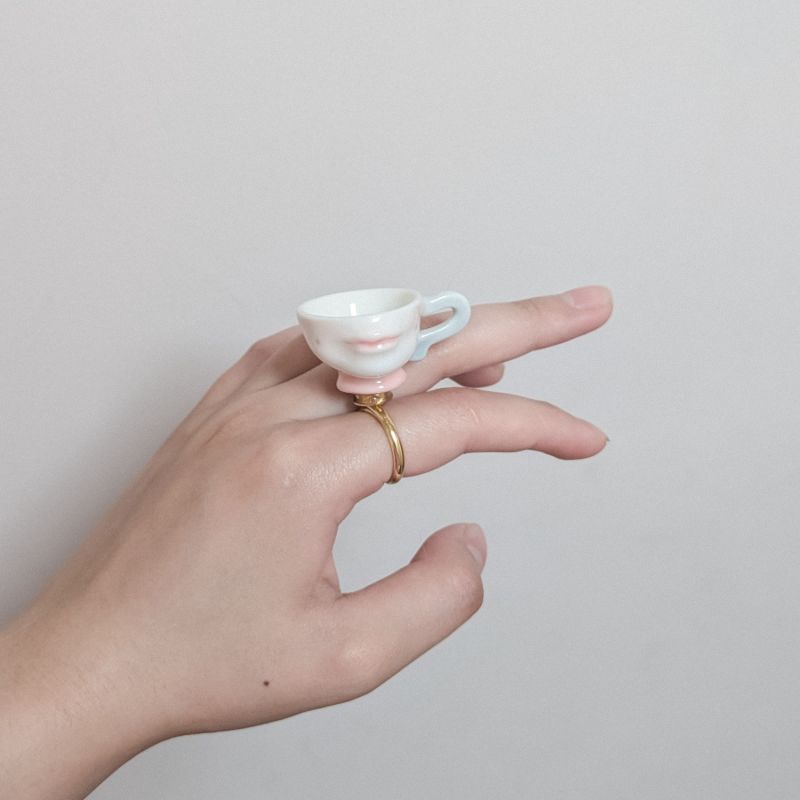 The Kissing Cup Spinning Mini Porcelain Cup Ring | H2 Studio | Wolf ...
