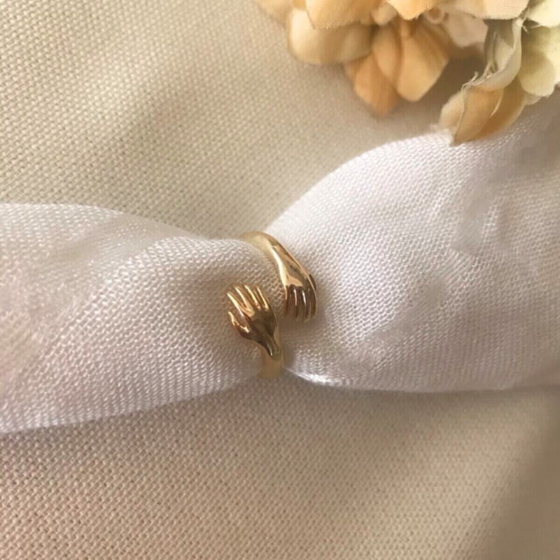 Hug Ring With Hands Sterling Silver - Gold | Spero London | Wolf & Badger