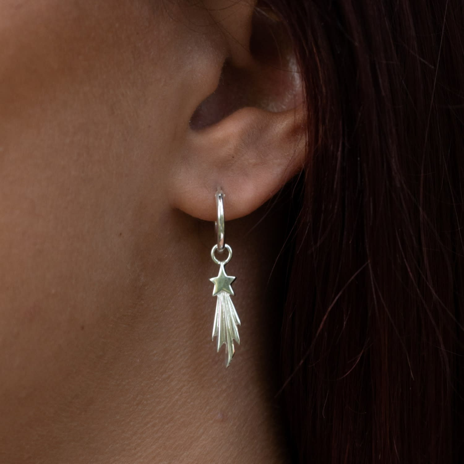Hoop earrings with feather charm store