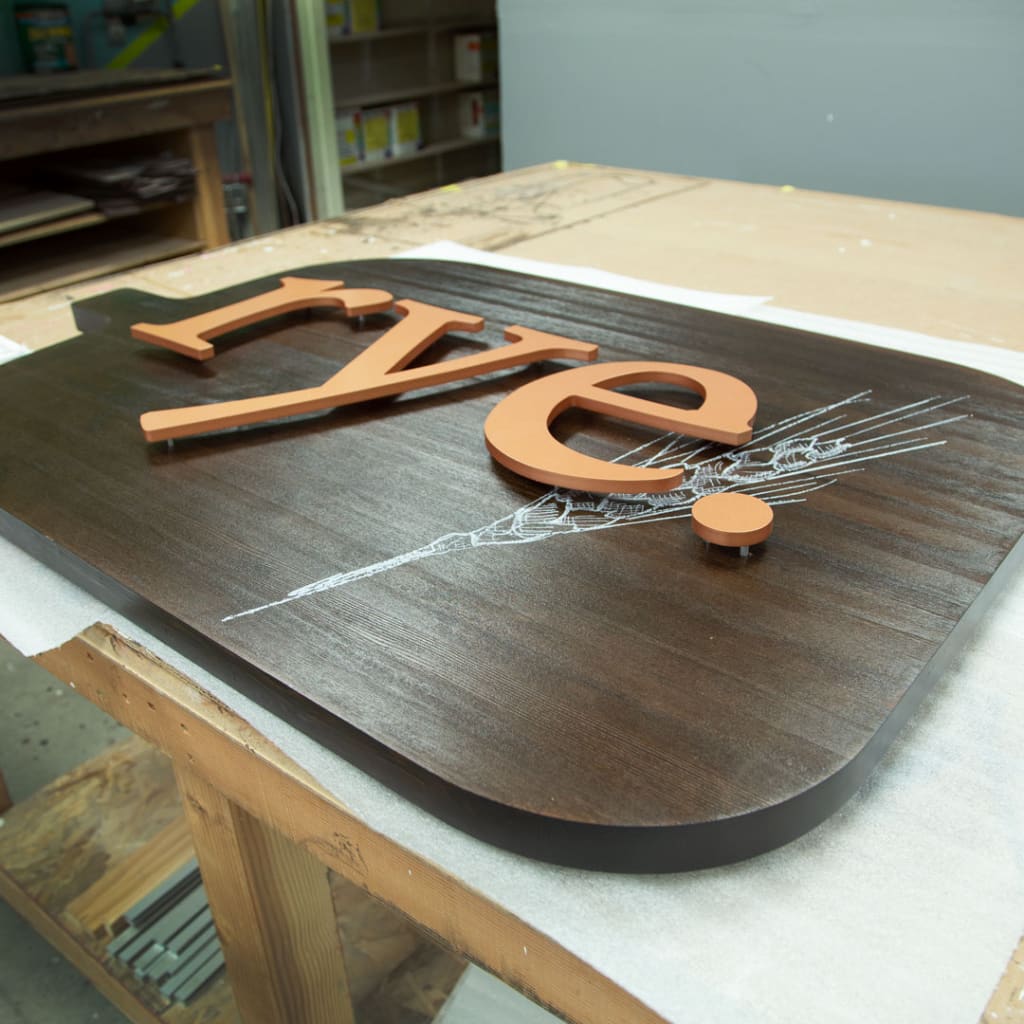 Custom Wood Signs - Carved Natural Signage | WoodlandManufacturing.com