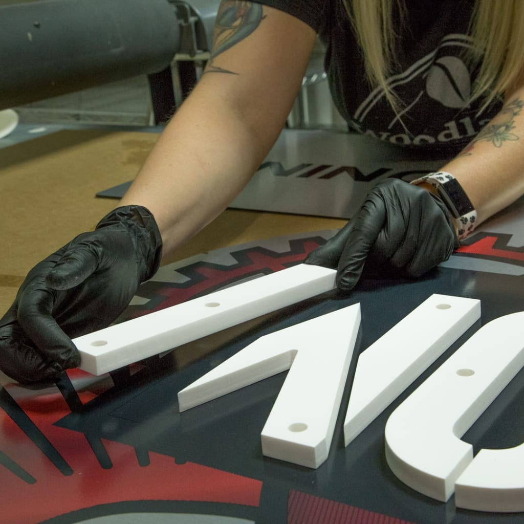 Custom Plastic Signs - Design with Low Prices | Woodland Mfg