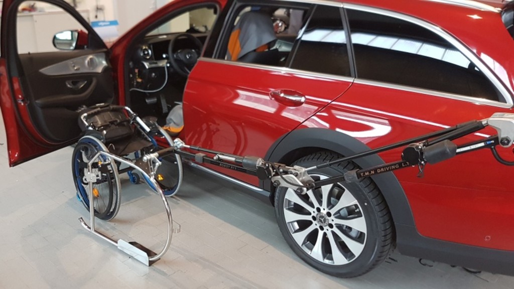 TMN's R11 Robot for automatic wheelchair storage in the vehicle's boot