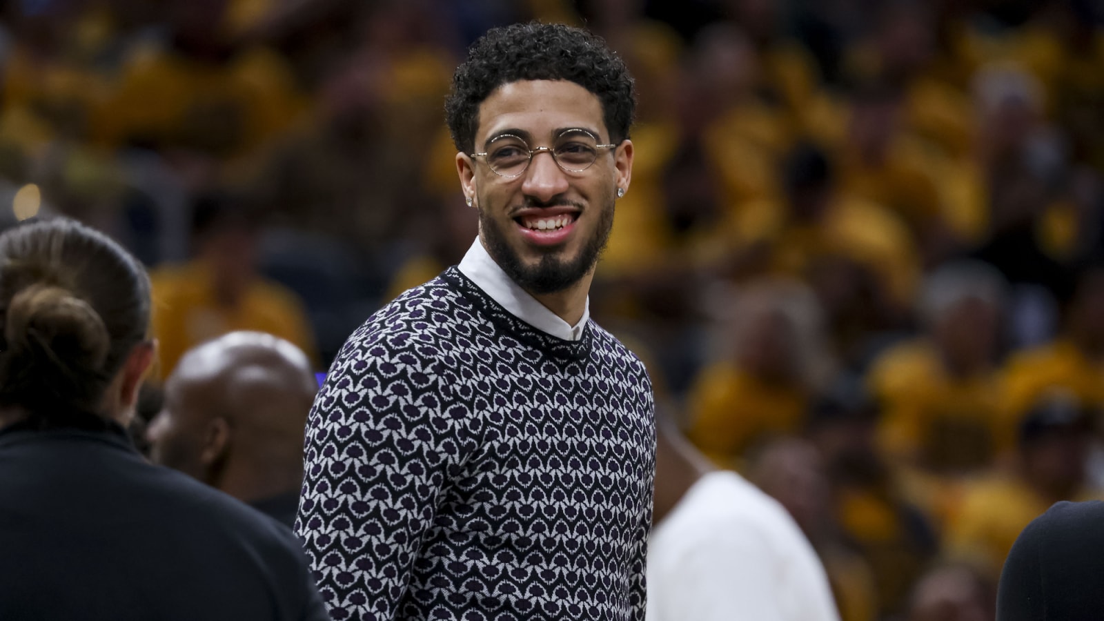 Indiana Pacers star Tyrese Haliburton sits courtside after Caitlin ...