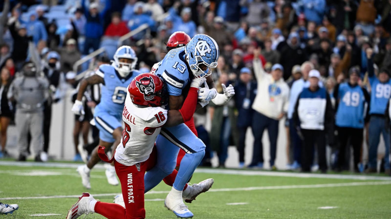 Massive Postgame Brawl Explodes After North Carolina-NC State Game ...