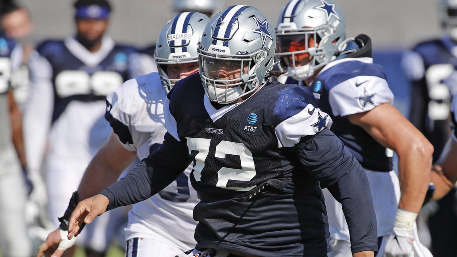 Trysten Hill fined $13K for hits on Chris Carson, Russell Wilson ...